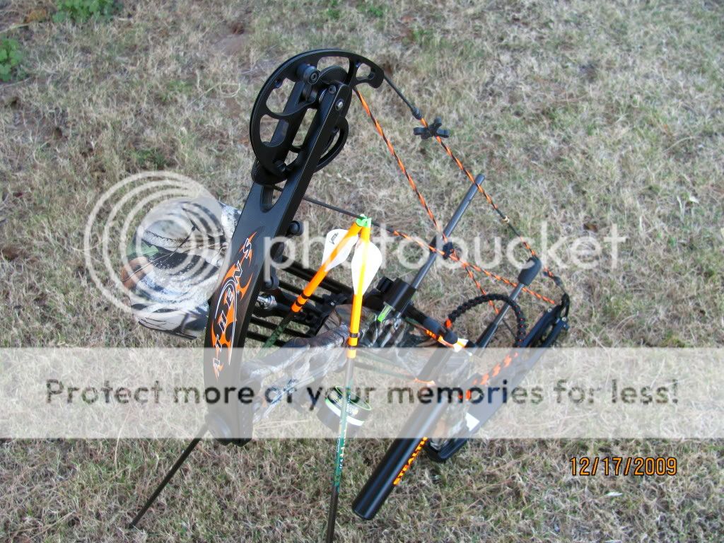 Bows with orange and black strings, arrows, or sling | Archery Talk Forum